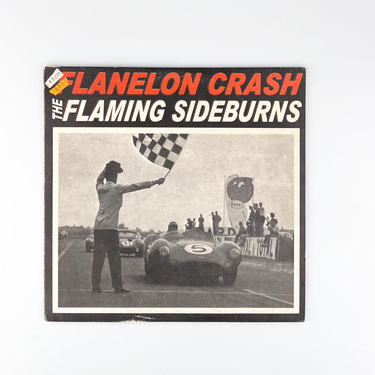 LP 10". Flanelon Crash Vs. The Flaming Sideburns – falsotecho